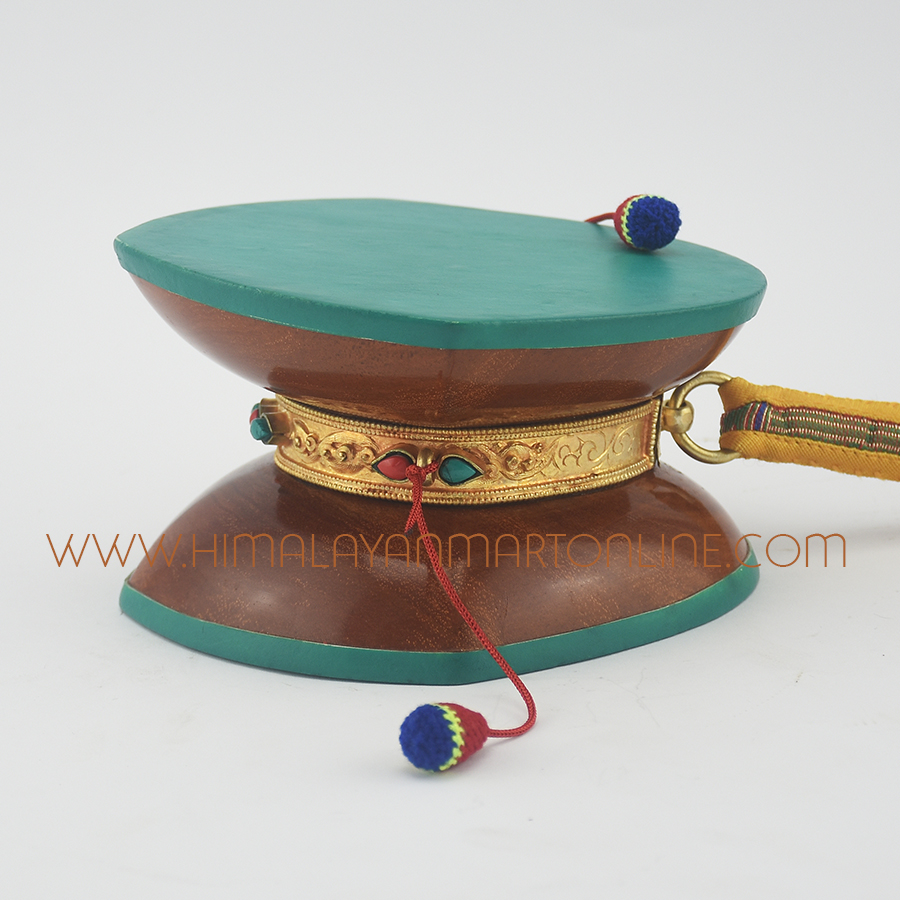 Tibetan Buddhist Ritual Drum: The Damru is a small drum with two heads.