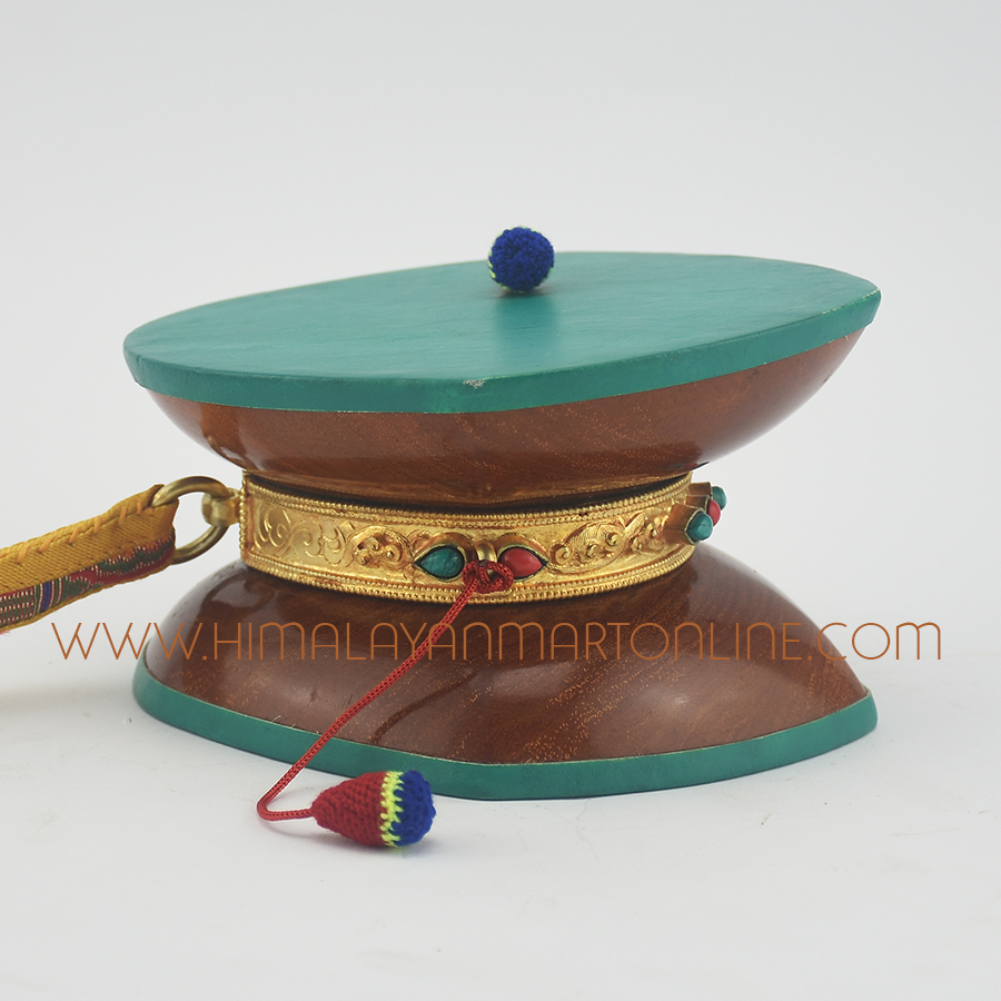 Tibetan Buddhist Ritual Drum: The Damru is a small drum with two heads.