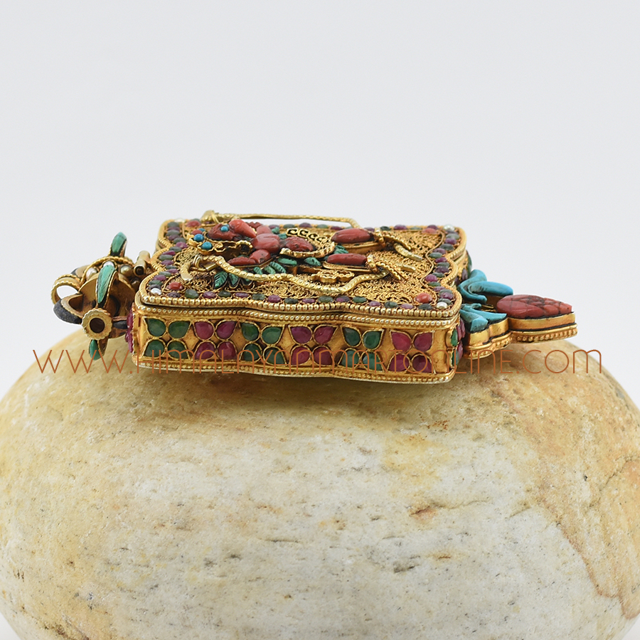 Garuda Silver Ghau: Ghau is a small prayer box worn as pendant by ...