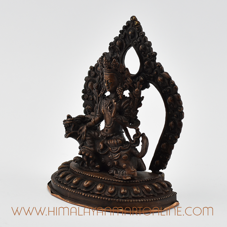 Green Tara on Lion Sculpture: Green Tara – The Saviouress.