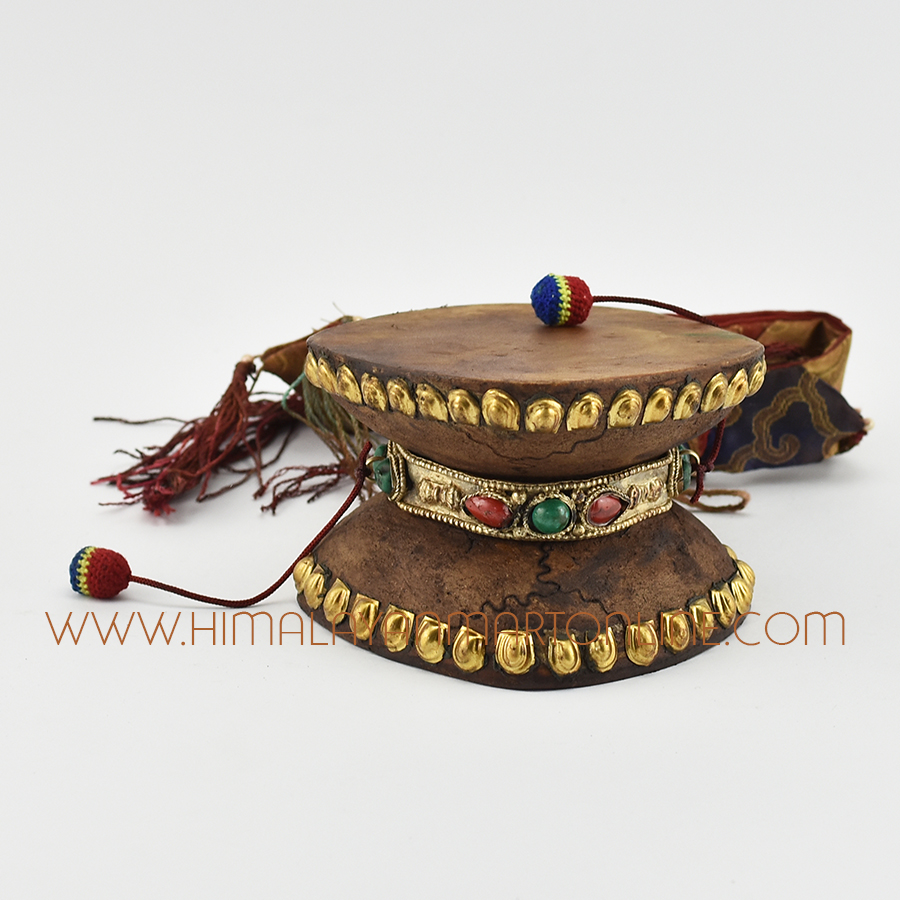 Buddhist Ritual Drum: The Damaru or Damru is a small Ritual Drum