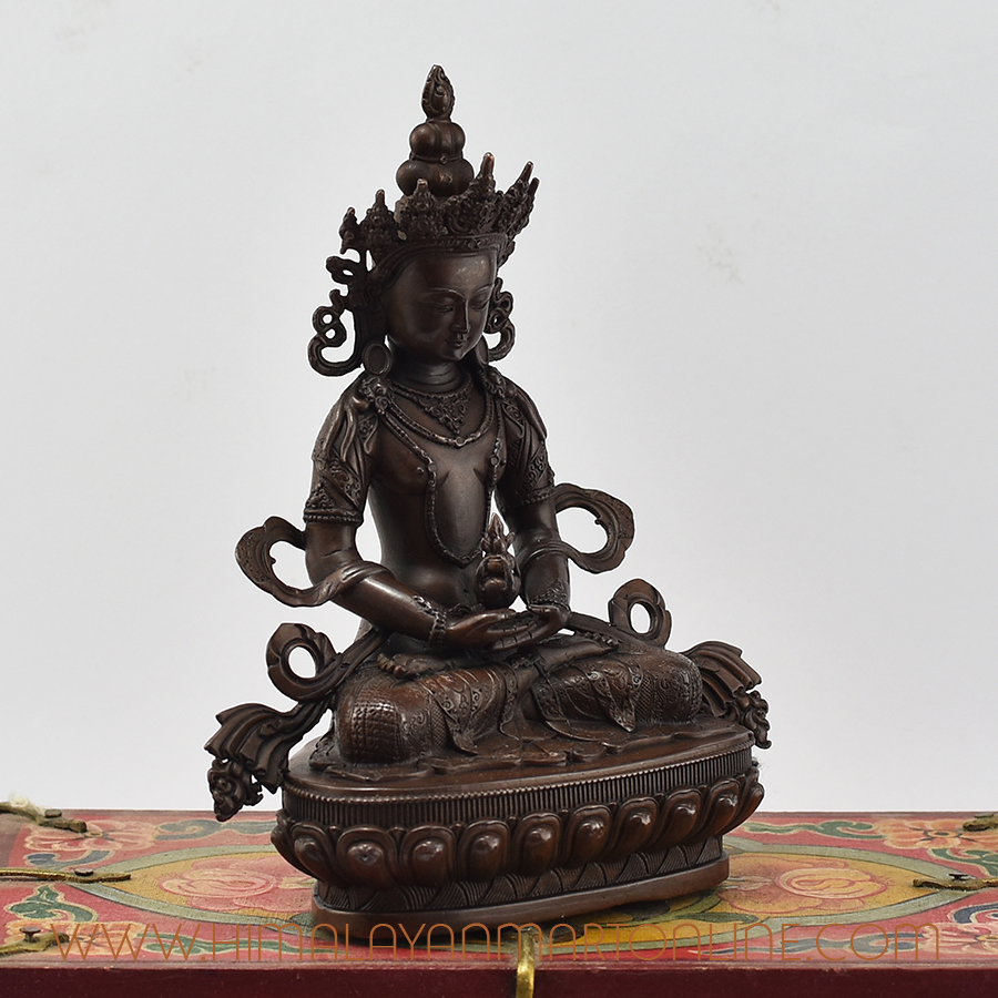 Small Aparmita Statue: This exquisite small statue depicts Aparmita